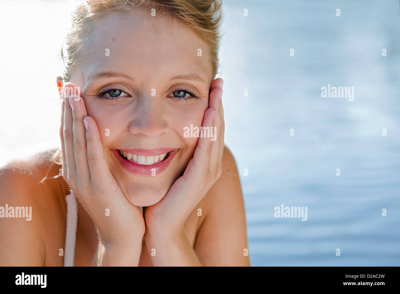Cupping chin in hand hi-res stock photography and images - Alamy