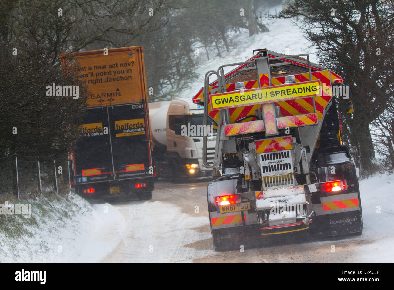 Wales, UK, 18 January 2013. A Halfords lorry gets stuck in snow and ...