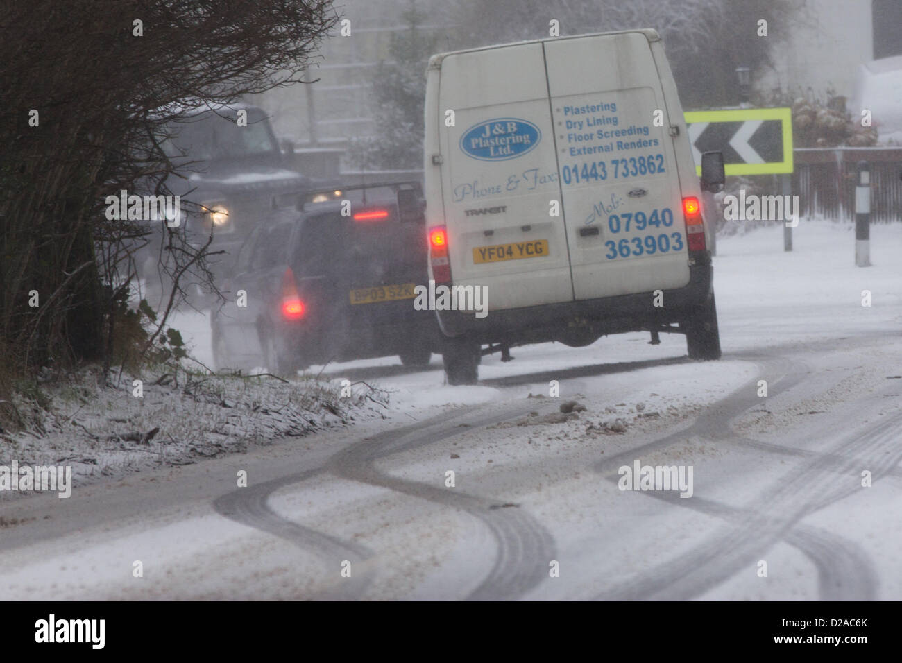 Wales, UK, 18 January 2013. A Halfords lorry gets stuck in snow and ...