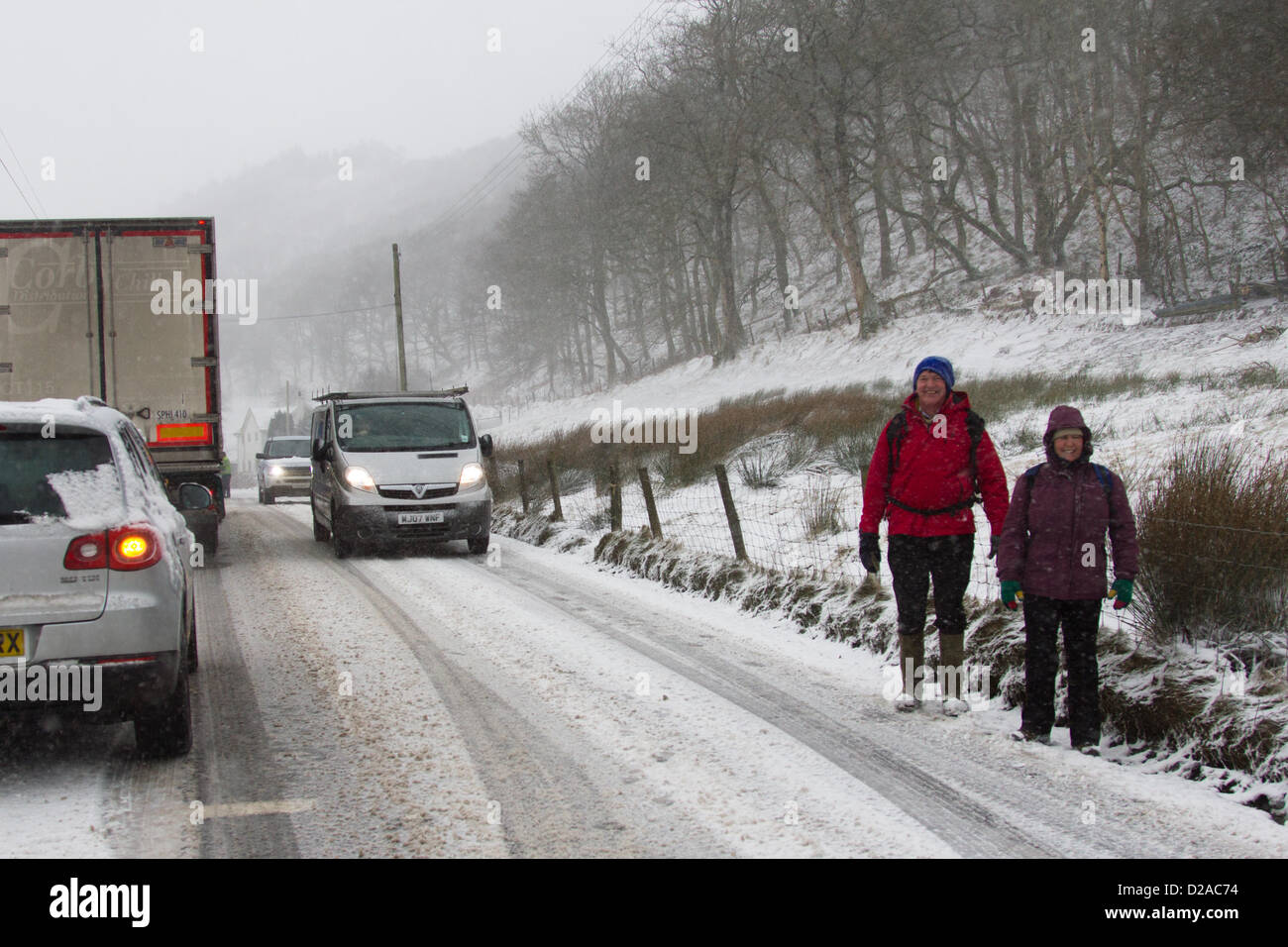 Wales, UK, 18 January 2013. A Halfords lorry gets stuck in snow and ...