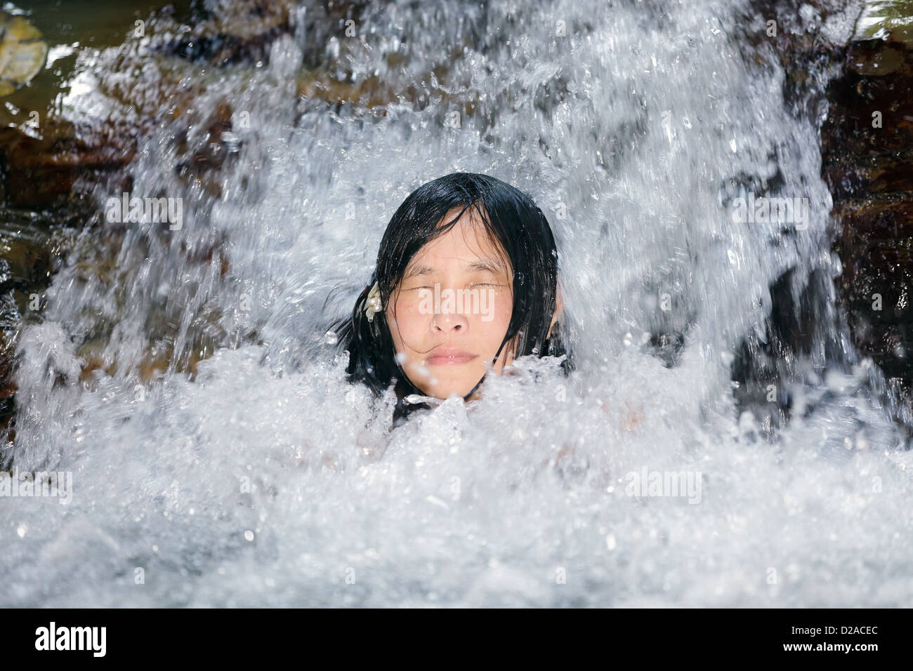 Woman bathing in stream hi-res stock photography and images - Alamy