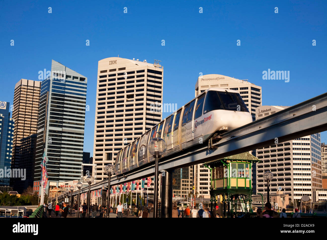 Sydney Monorail crossing Pyrmont Bridge above the heads of walking ...