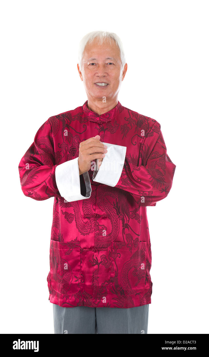 asian senior chinese man celebrating lunar new year, with traditional ...