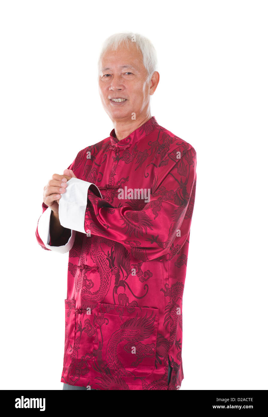 asian senior chinese man celebrating lunar new year, with traditional ...
