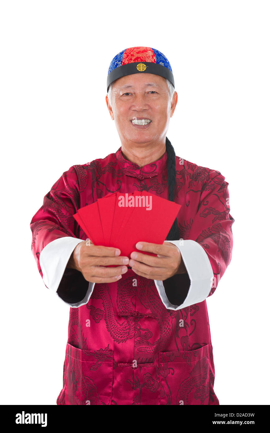 asian senior chinese male holding ang pow Stock Photo - Alamy
