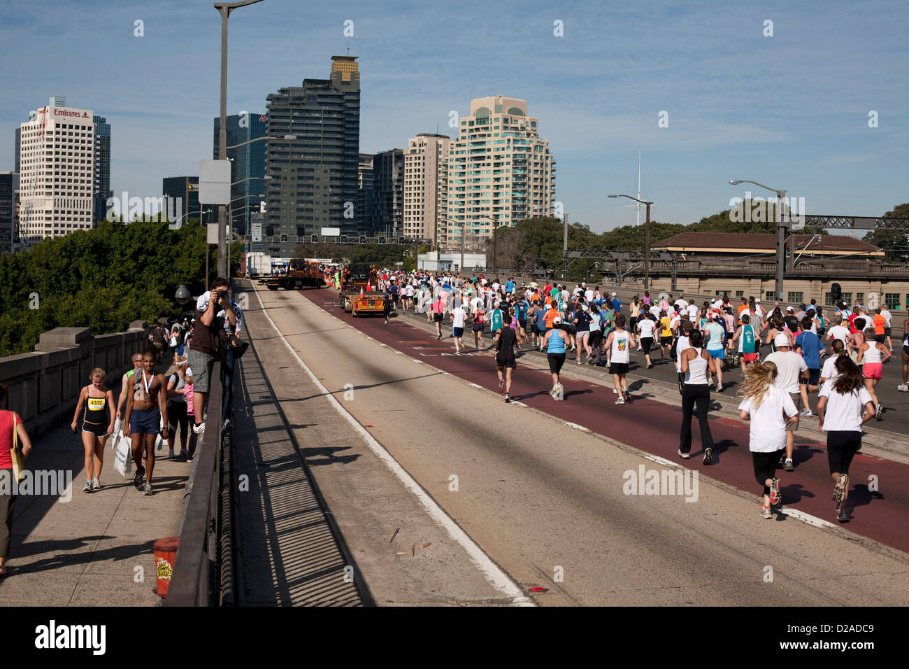Thousands of fitness enthusiasts taking part in a Charity fun run ...