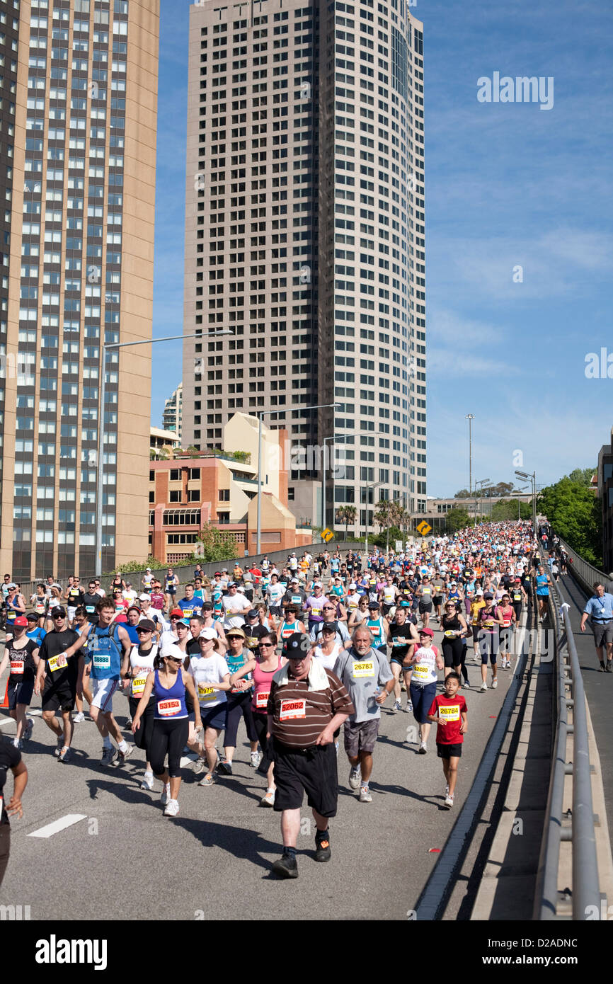 Crowds in their thousands of fitness enthusiasts on a charity fun run ...