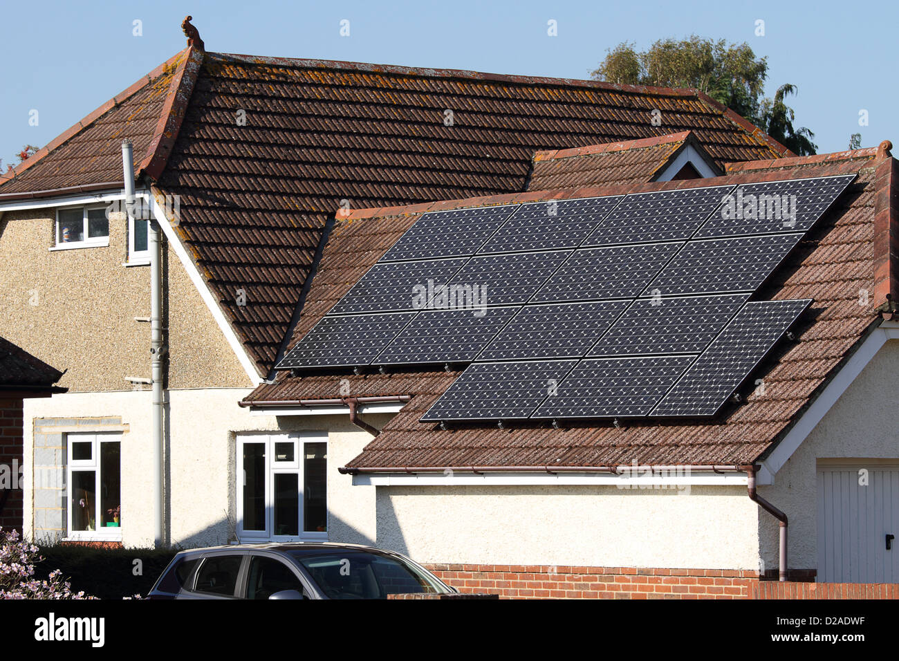 Solar photovoltaic panels on house roof Stock Photo - Alamy
