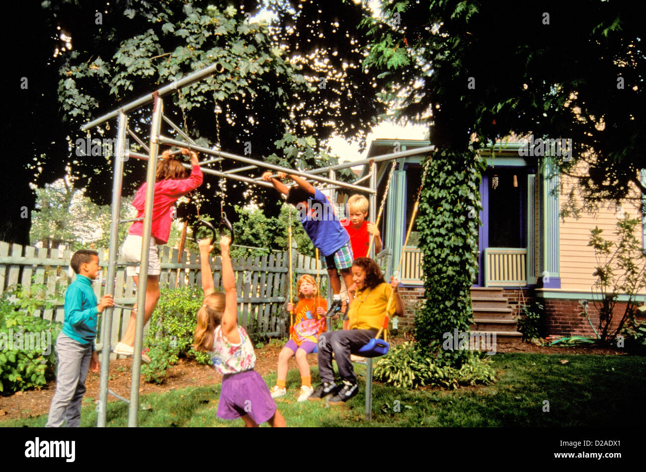 Children playing outdoors on monkey bars hi-res stock photography and ...