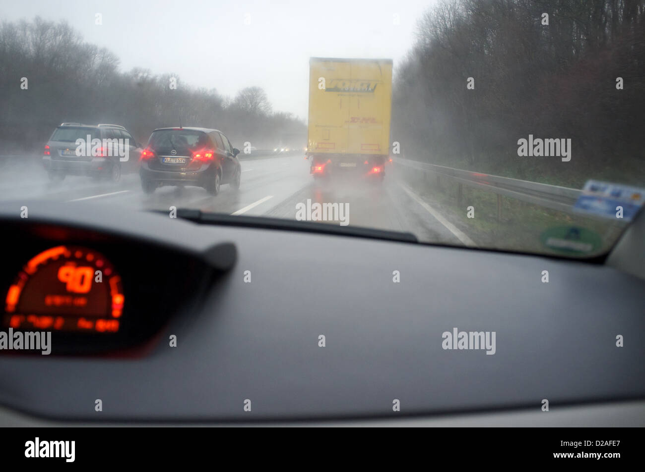 Speeding traffic on a wet German motorway (autobahn Stock Photo - Alamy
