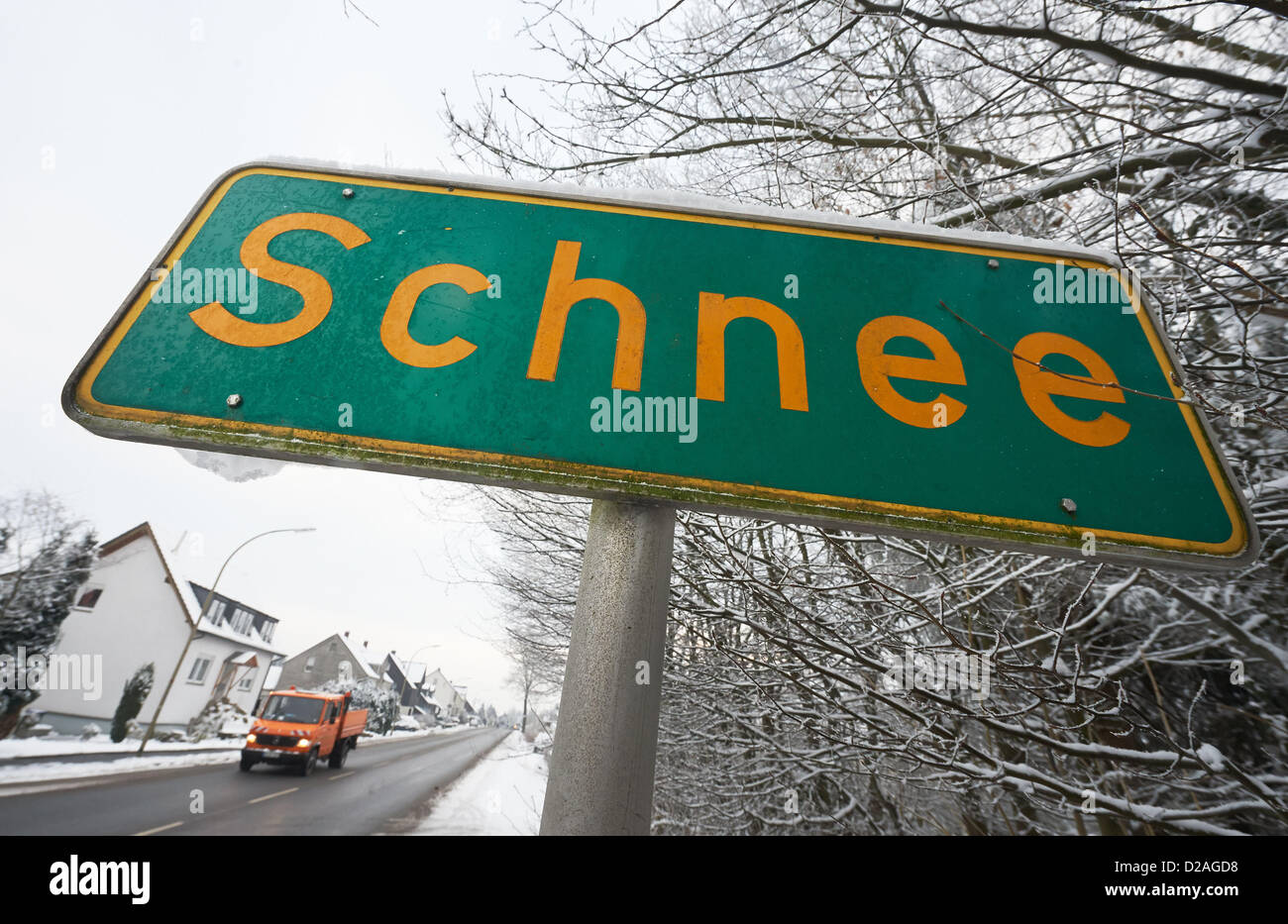 A vehicle drives past the place name sign of the district 'Schnee ...