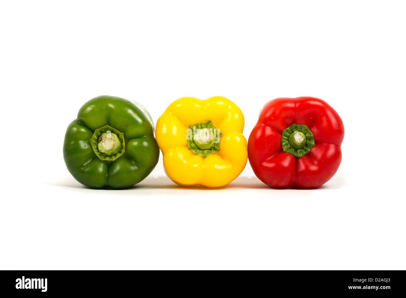 Colored paprika's on a white background Stock Photo - Alamy
