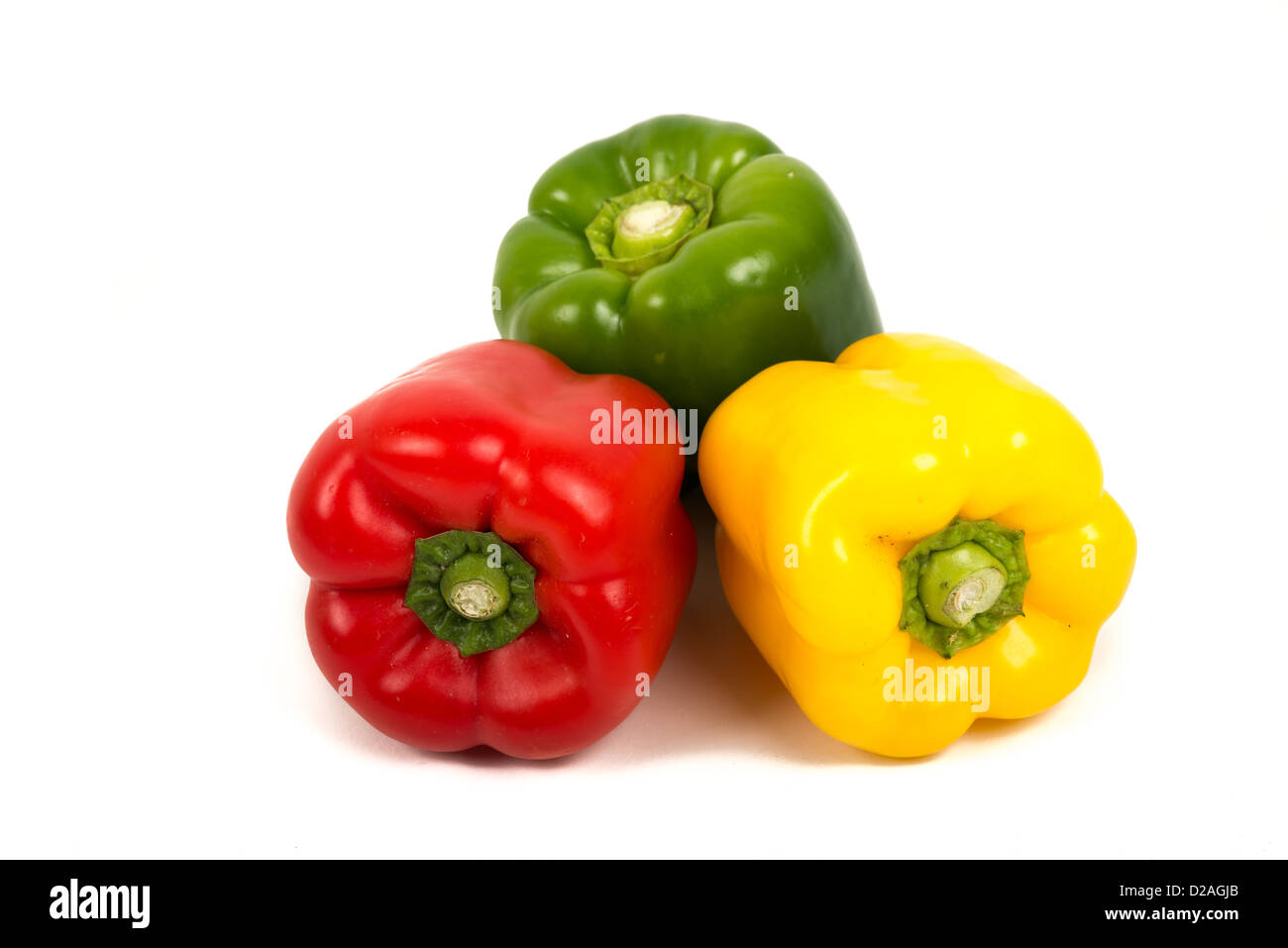 Colored paprika's on a white background Stock Photo - Alamy