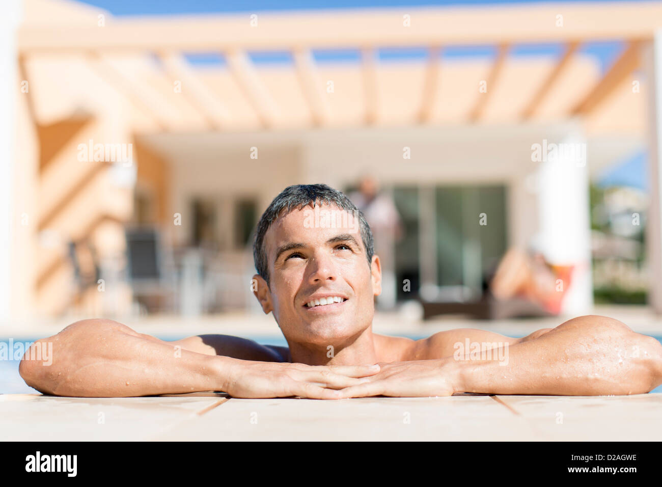 Man resting on edge swimming hi-res stock photography and images - Alamy