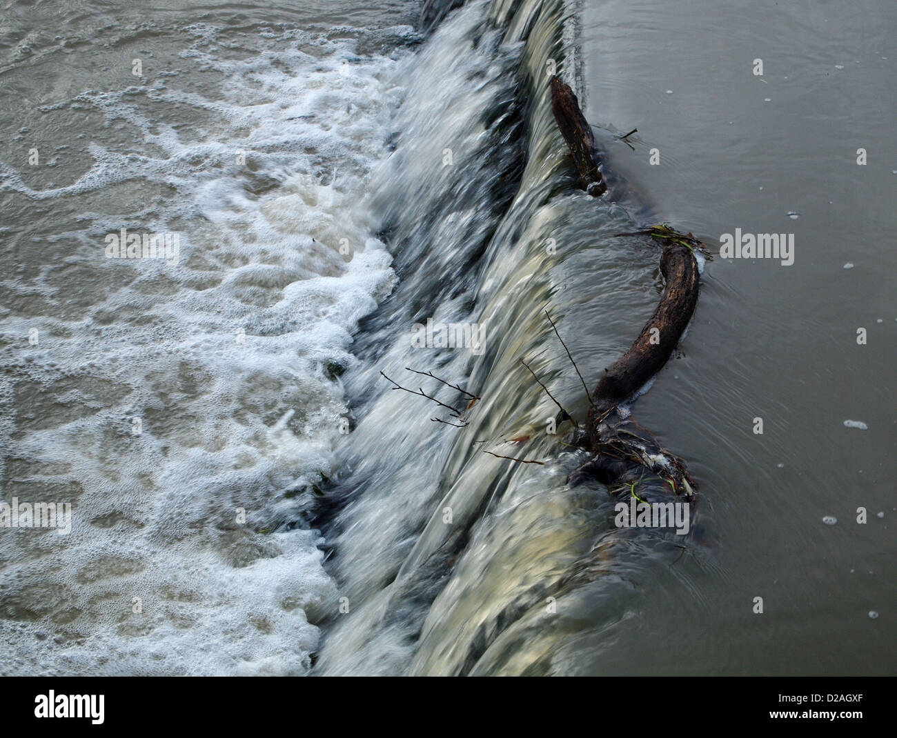 river flood with log at the falls Stock Photo - Alamy