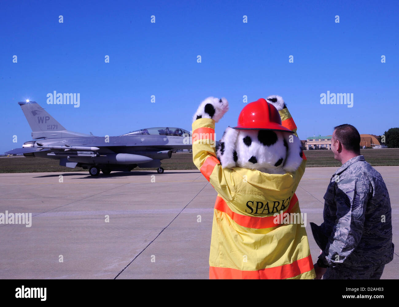 Sparky, the 8th Civil Engineer Squadron's mascot, gives the 'crush 'em ...