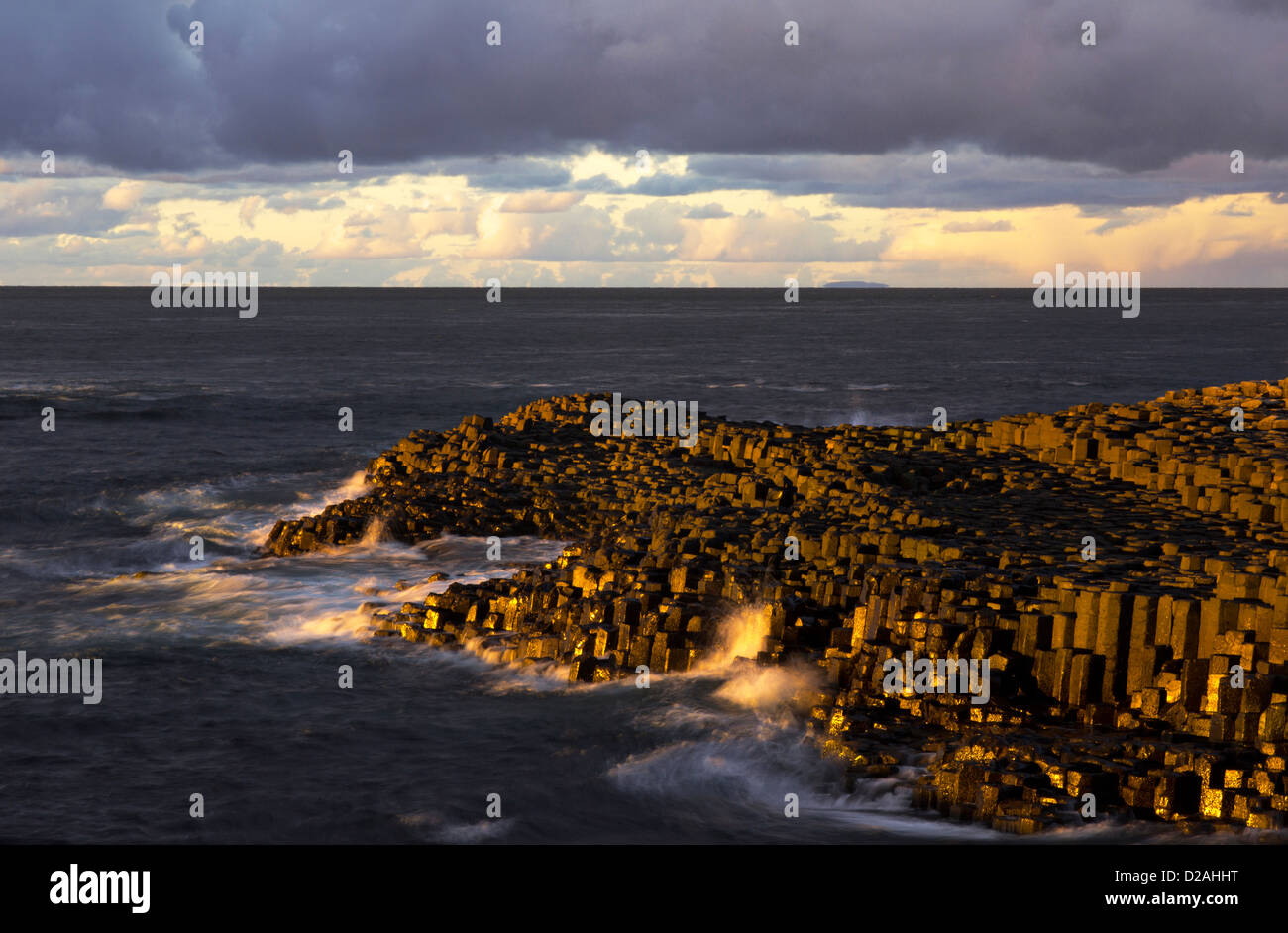 Last rays of sun shining on the basaltic columns from the famous Giant ...