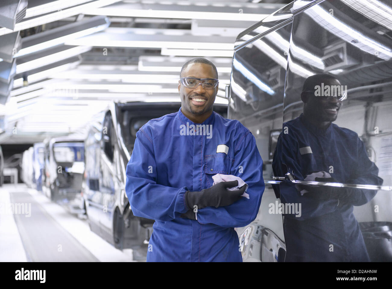 Smiling automotive assembly line worker hi-res stock photography and ...