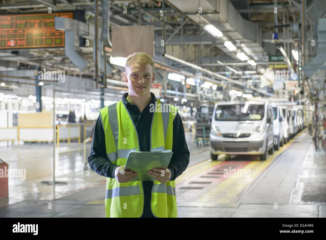 Smiling automotive assembly line worker hi-res stock photography and ...