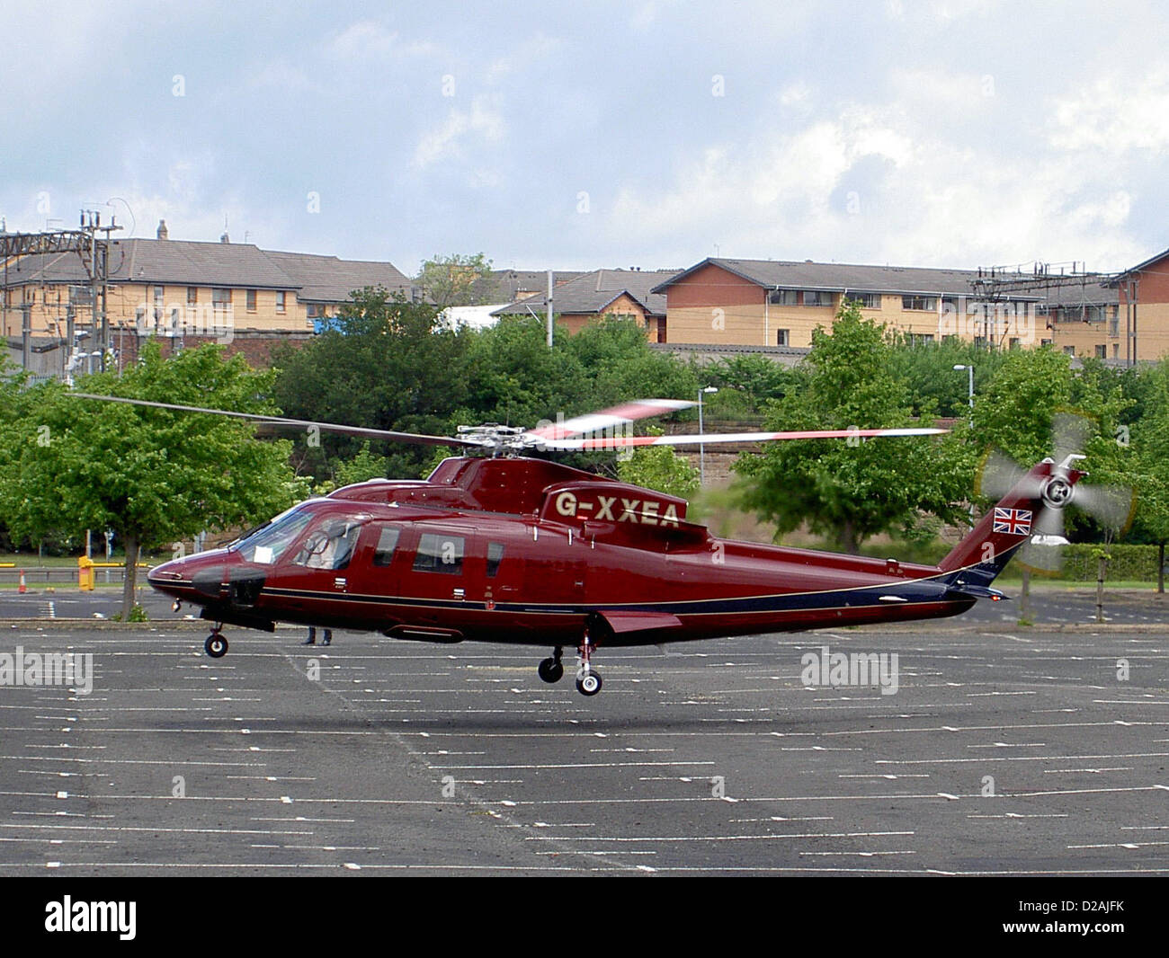 The Sikorsky S-76C+ helicopter, registration G-XXEA, takes off with ...