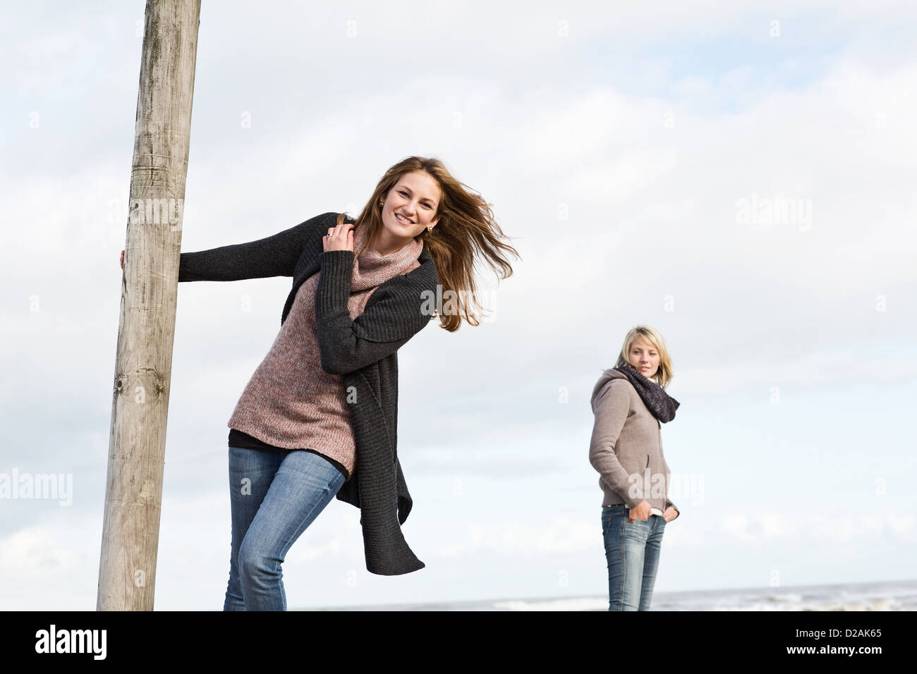 Swinging from pole hi-res stock photography and images - Alamy