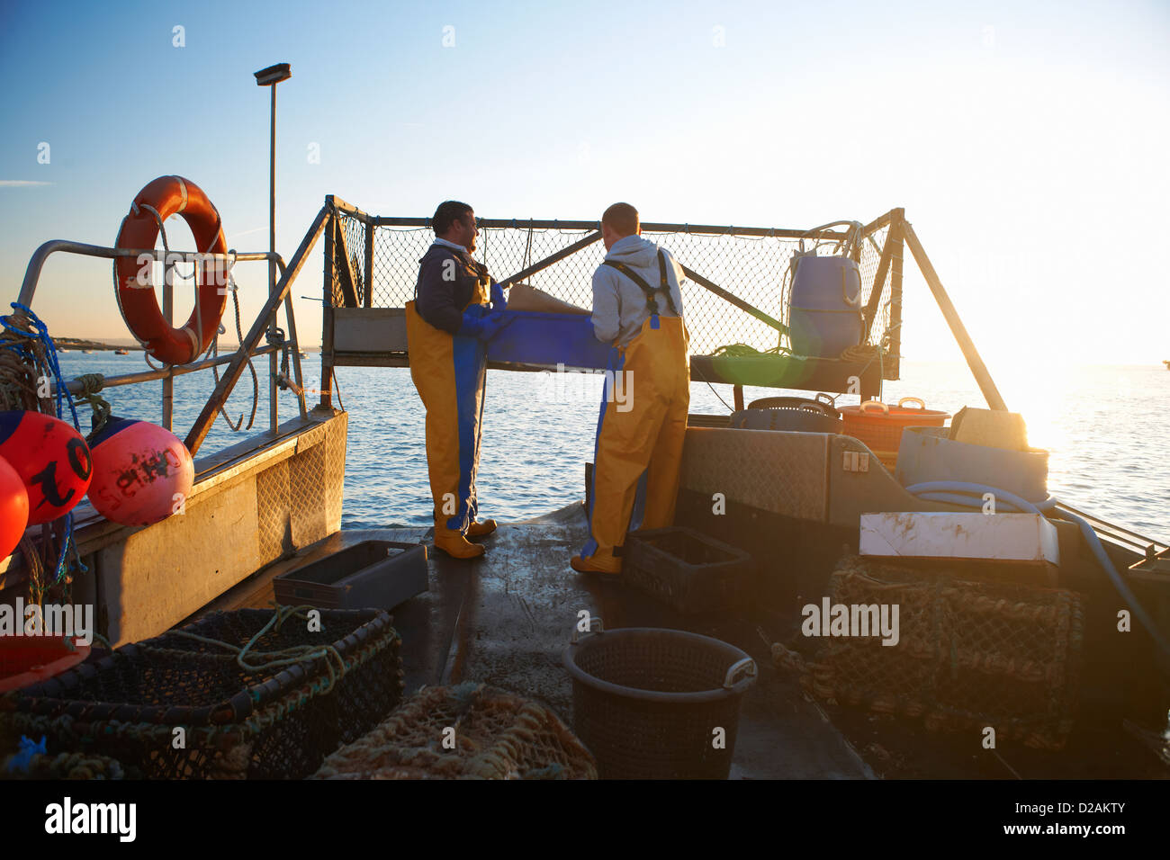 Work together fishermen hi-res stock photography and images - Alamy