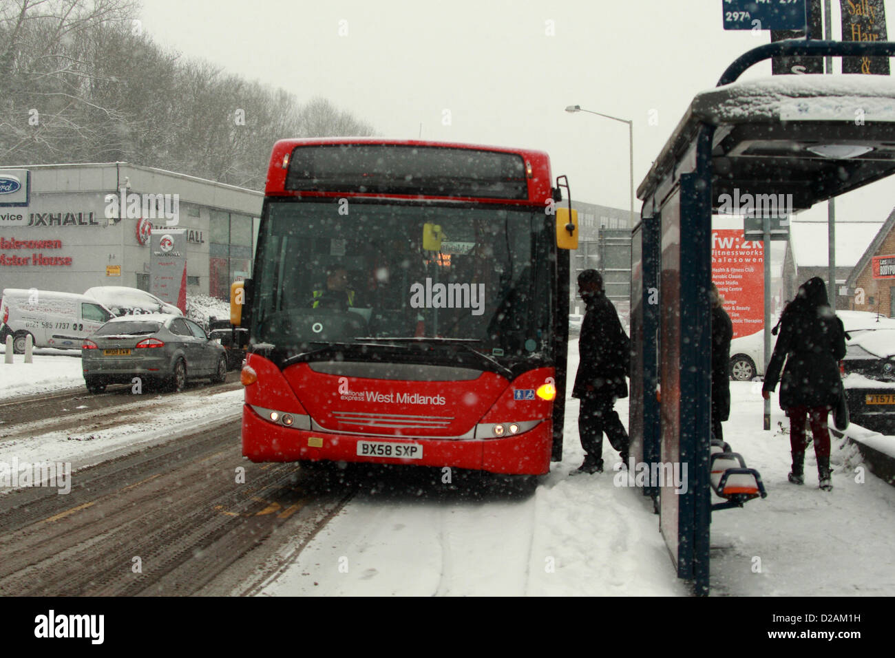 Public bus on snowy wintry roads, Birmingham UK Stock Photo - Alamy