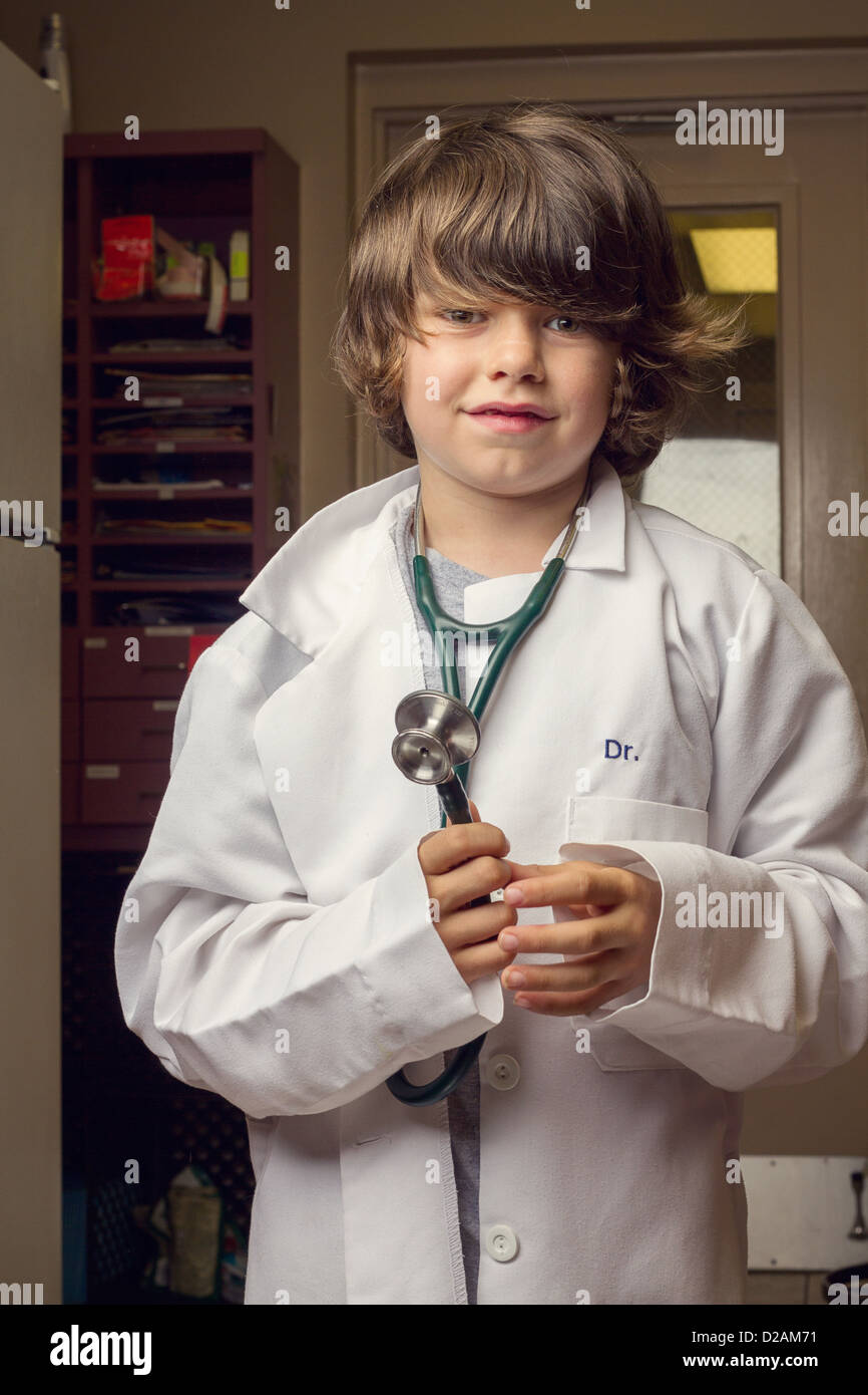 A young boy is dressed like a doctor Stock Photo - Alamy