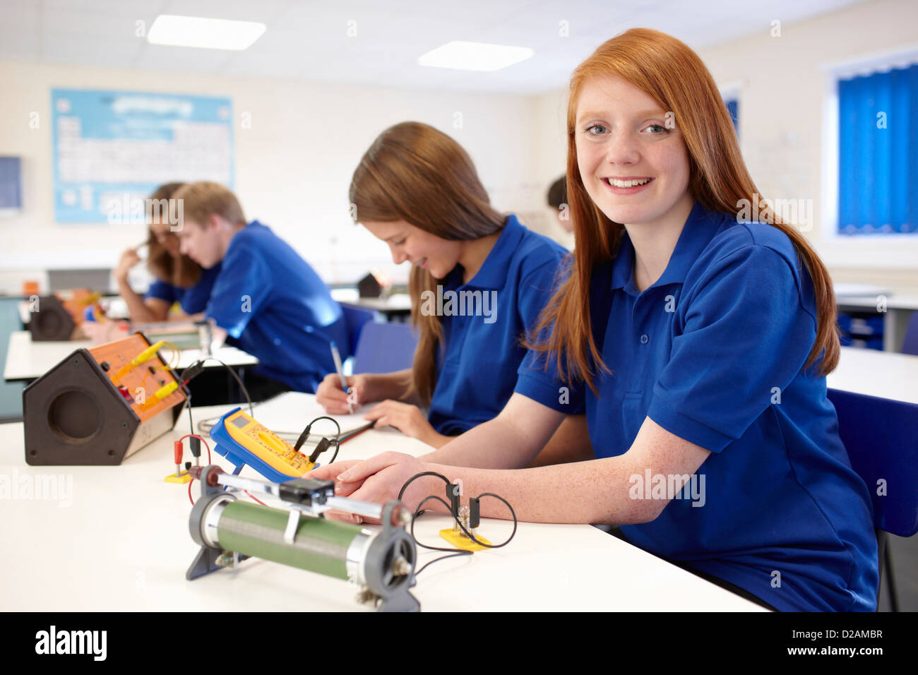 Students working in science class Stock Photo - Alamy