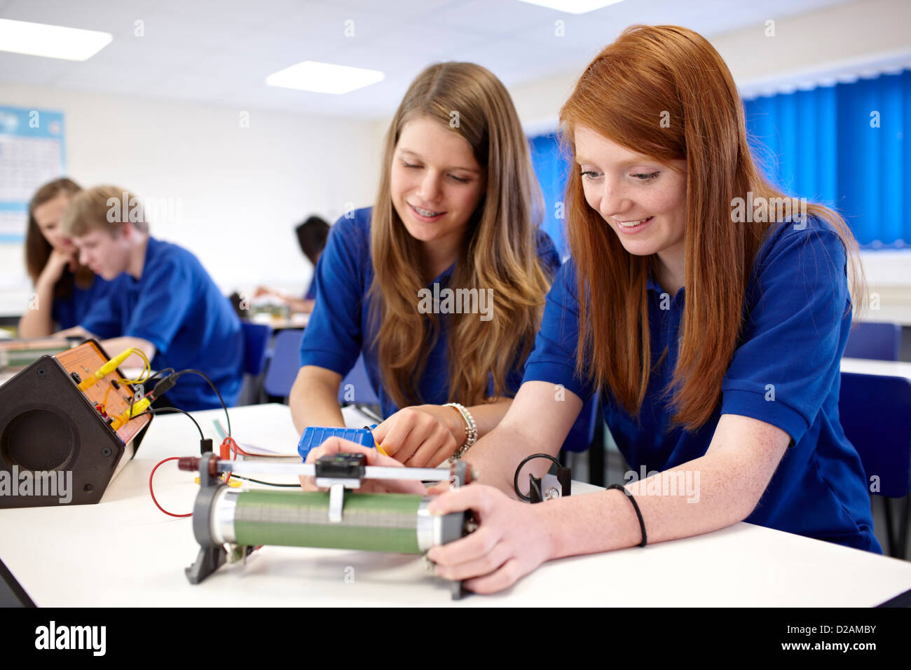 Students working in science class Stock Photo - Alamy
