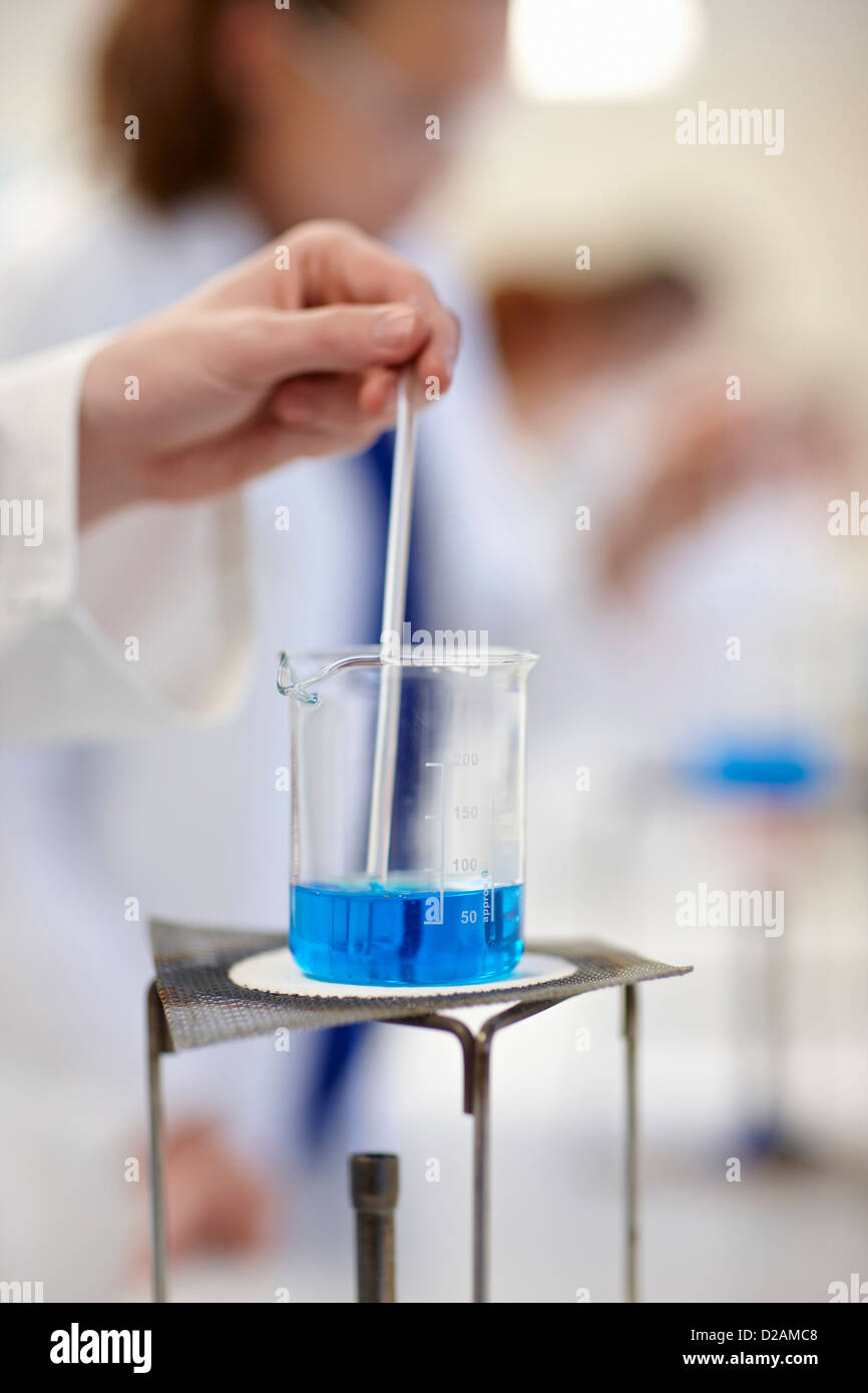 Student working in chemistry lab Stock Photo - Alamy