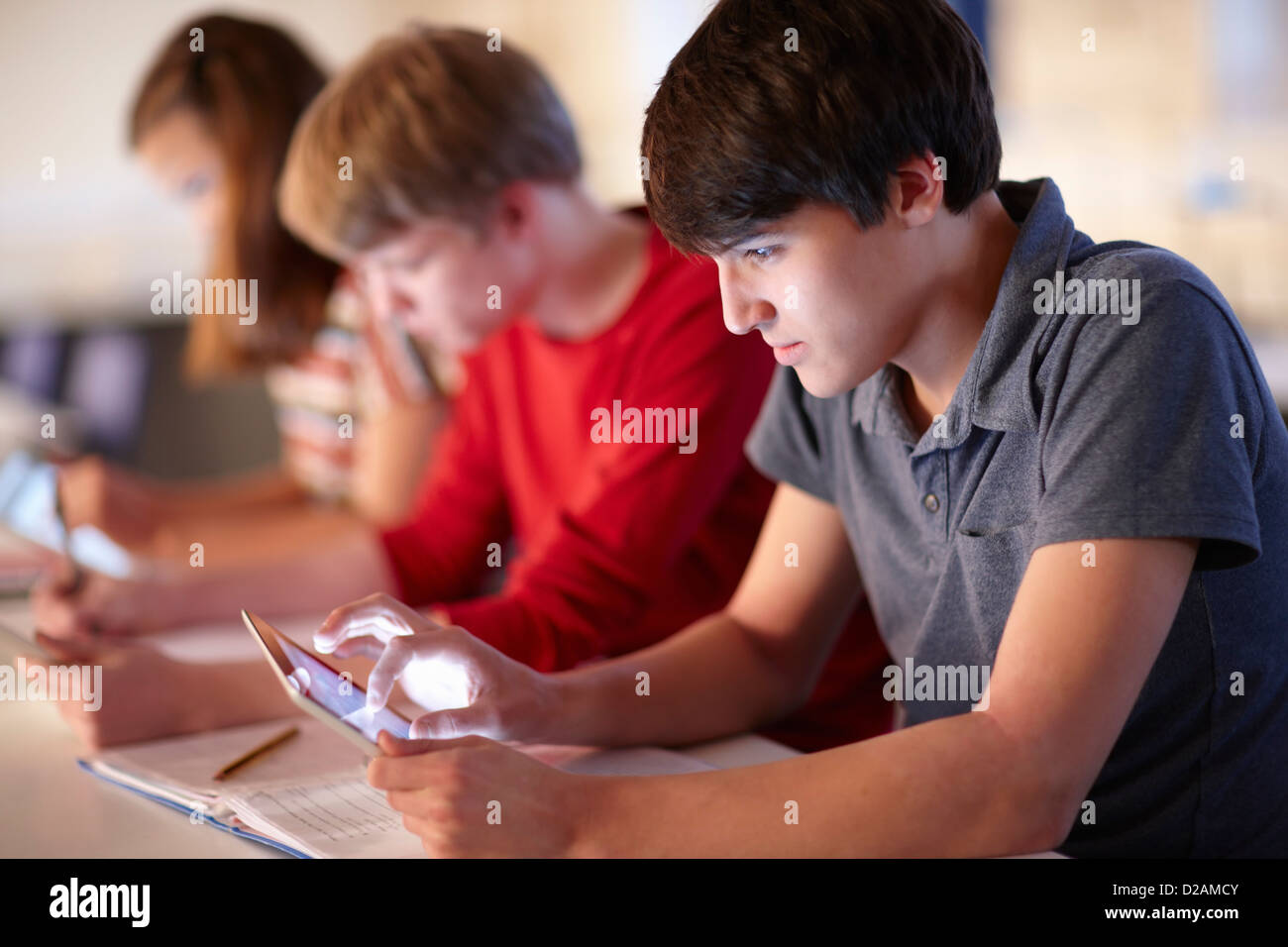 Students using tablet computers in class Stock Photo - Alamy