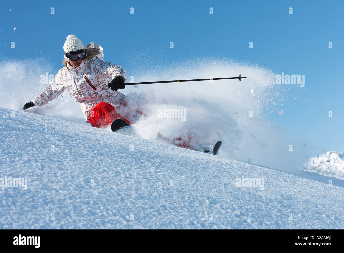 Skier on snowy slope Stock Photo - Alamy