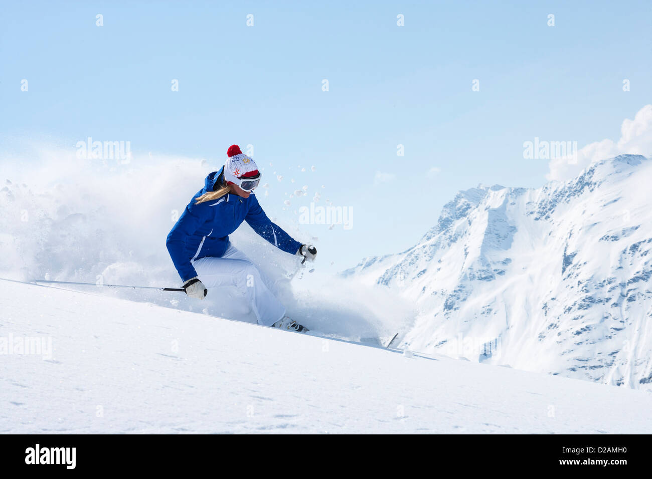Skier on snowy slope Stock Photo - Alamy