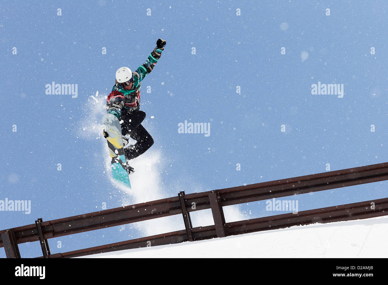 Young man jumping over railing hi-res stock photography and images - Alamy