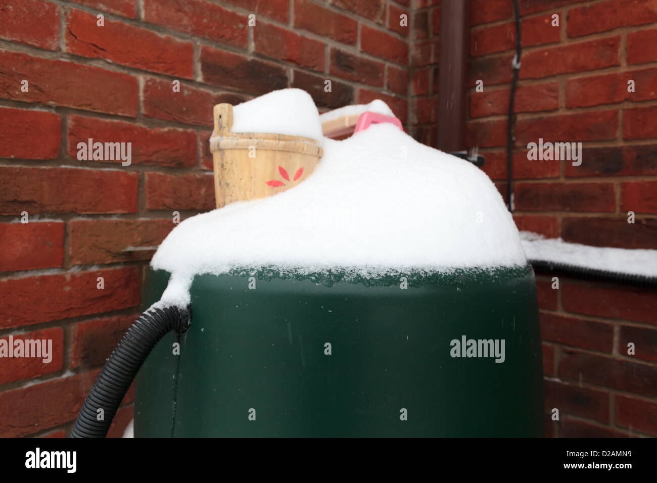 18 January 2013. Weston Rhyn near Oswestry. A water barrel shows the ...