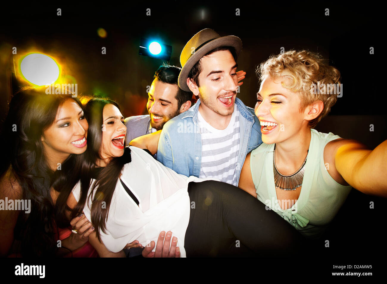 Young men hanging out nightclub hi-res stock photography and images - Alamy