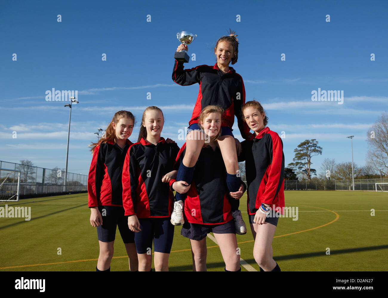 Sports team cheering together Stock Photo - Alamy