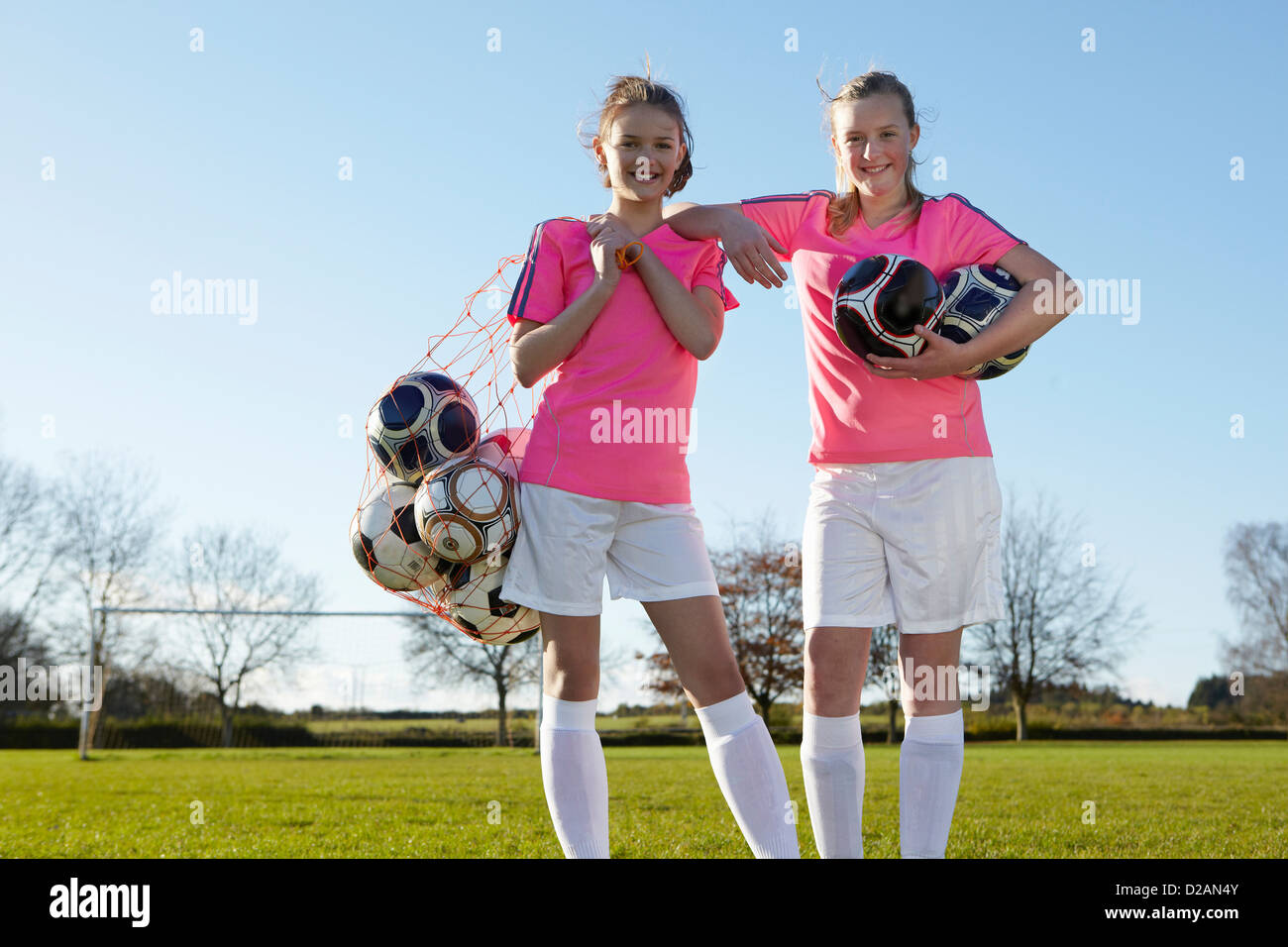 Portrait two teenage girls carrying hi-res stock photography and images ...