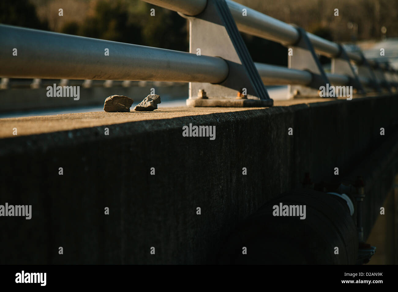 two rocks relaxing on bridge Stock Photo - Alamy