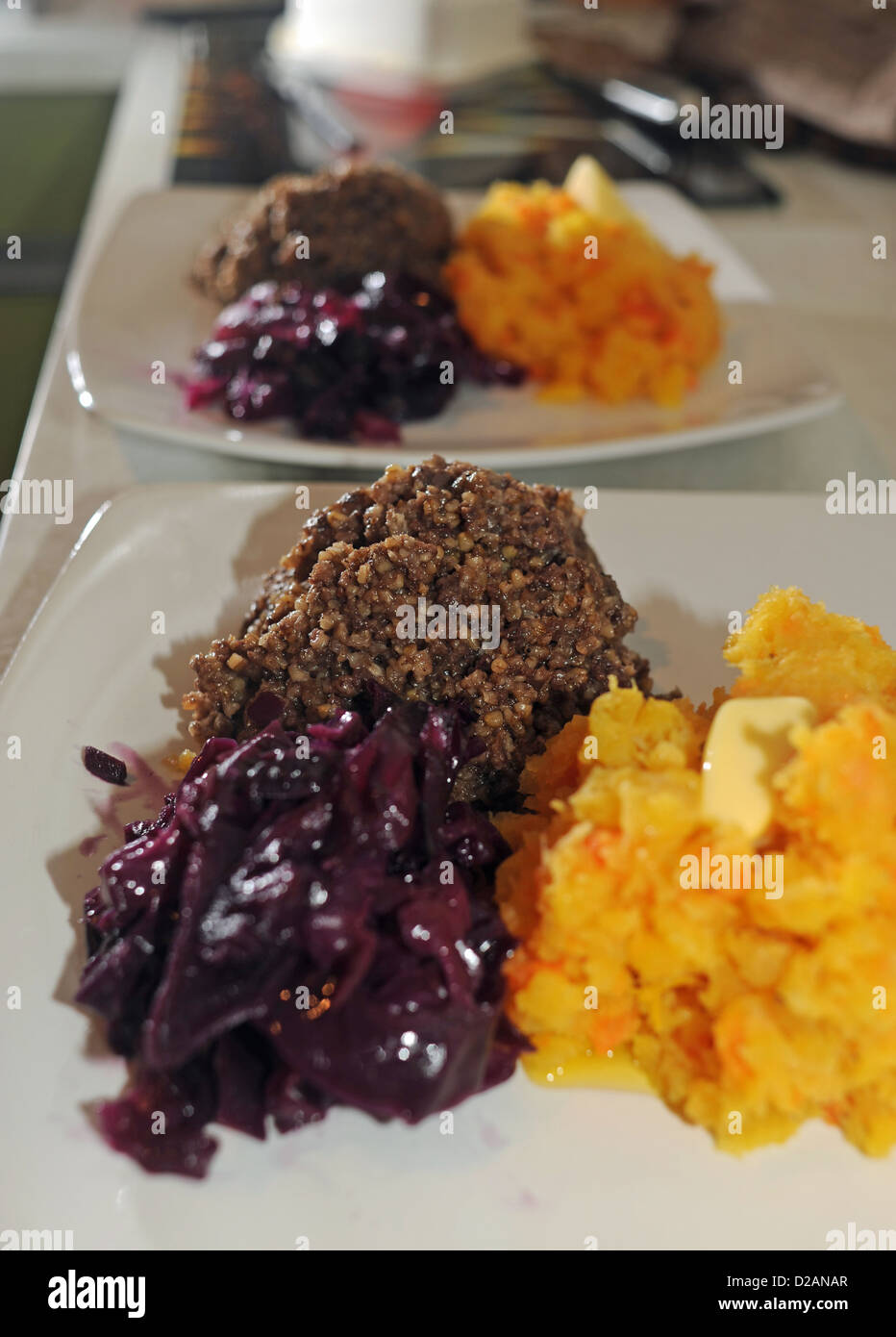 Haggis and swede with red cabbage hi-res stock photography and images ...