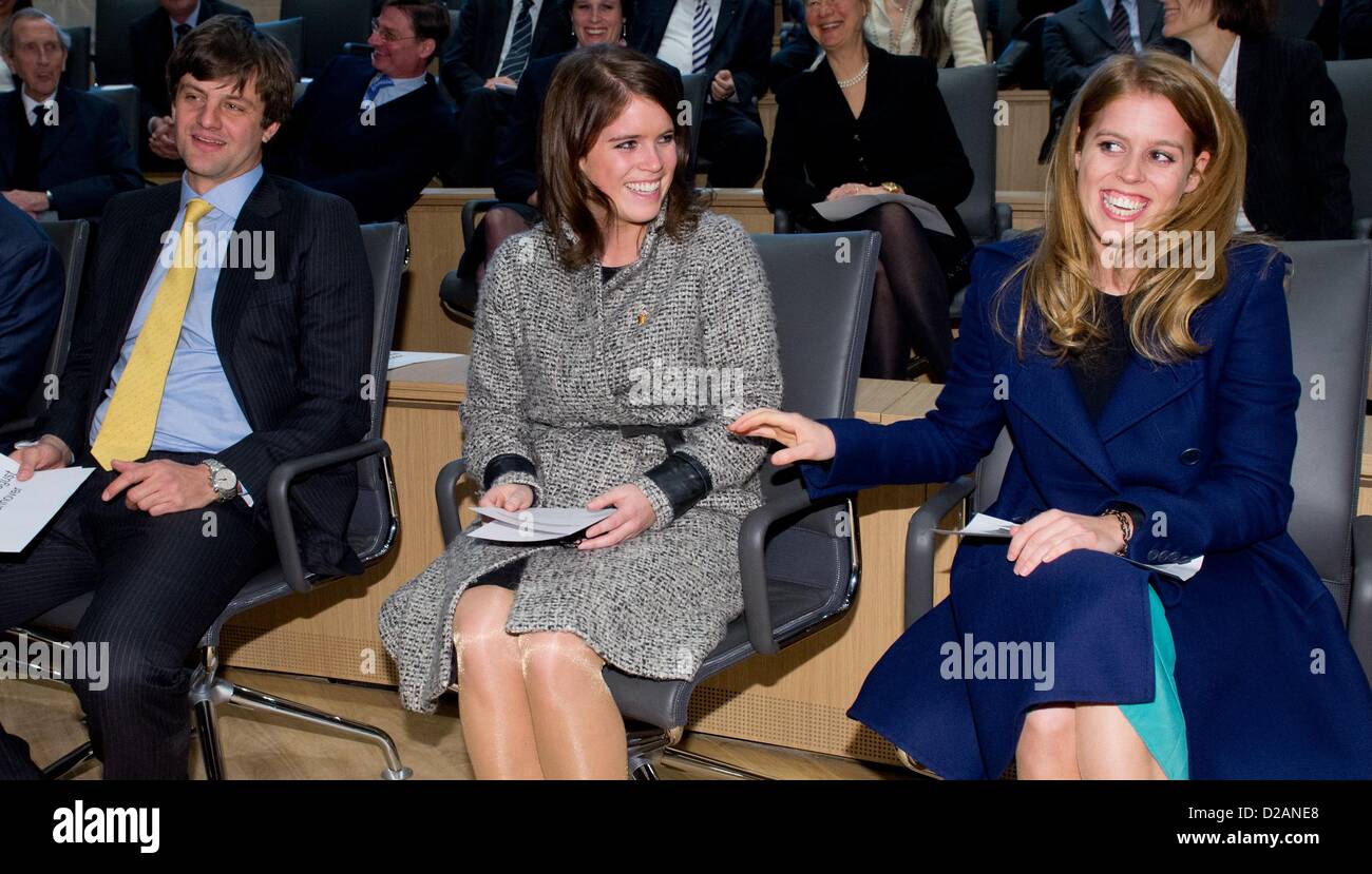 British princesses Beatrice of York (R), her sister Eugenie of York and ...