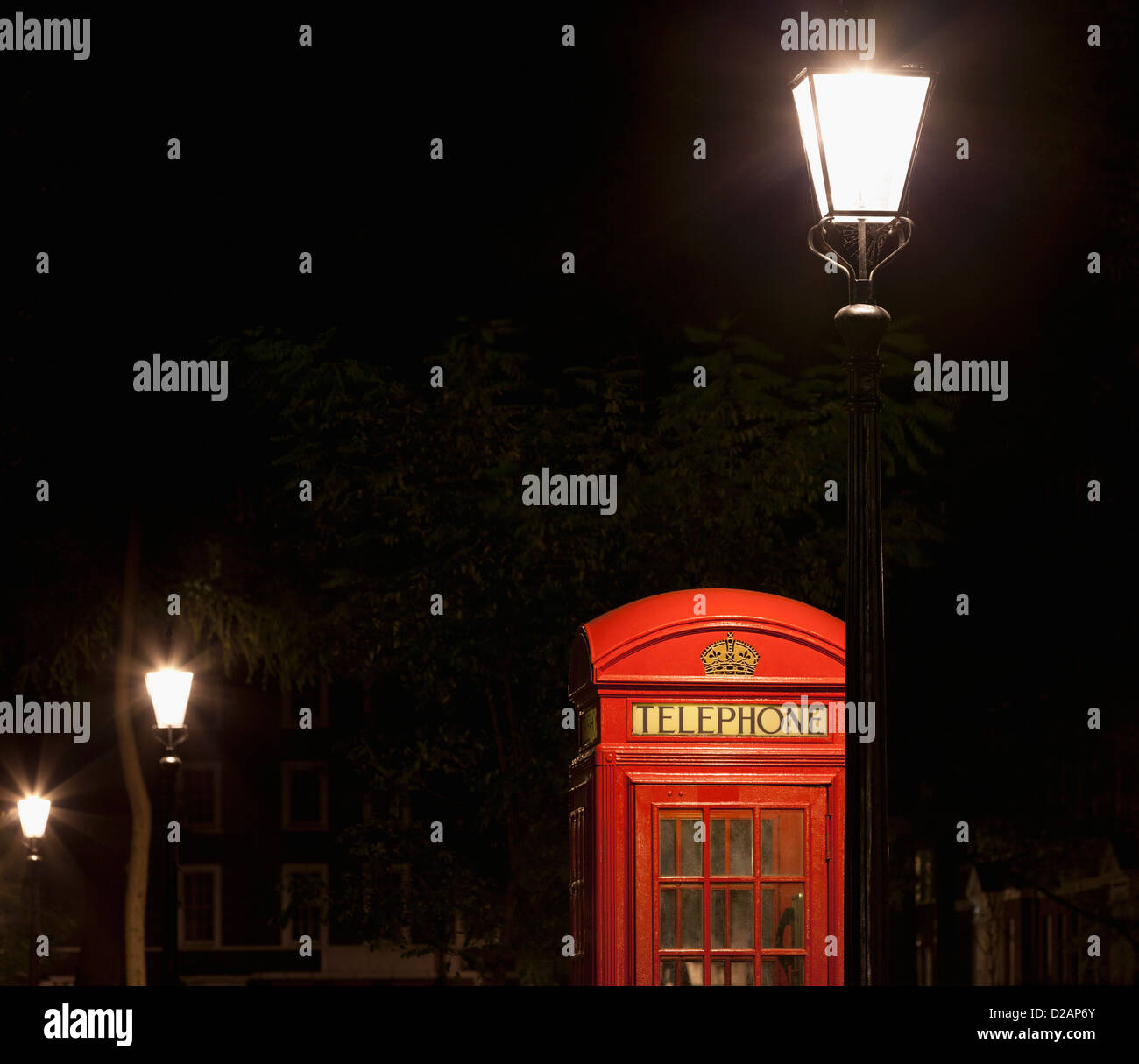 Red telephone box on city street Stock Photo - Alamy