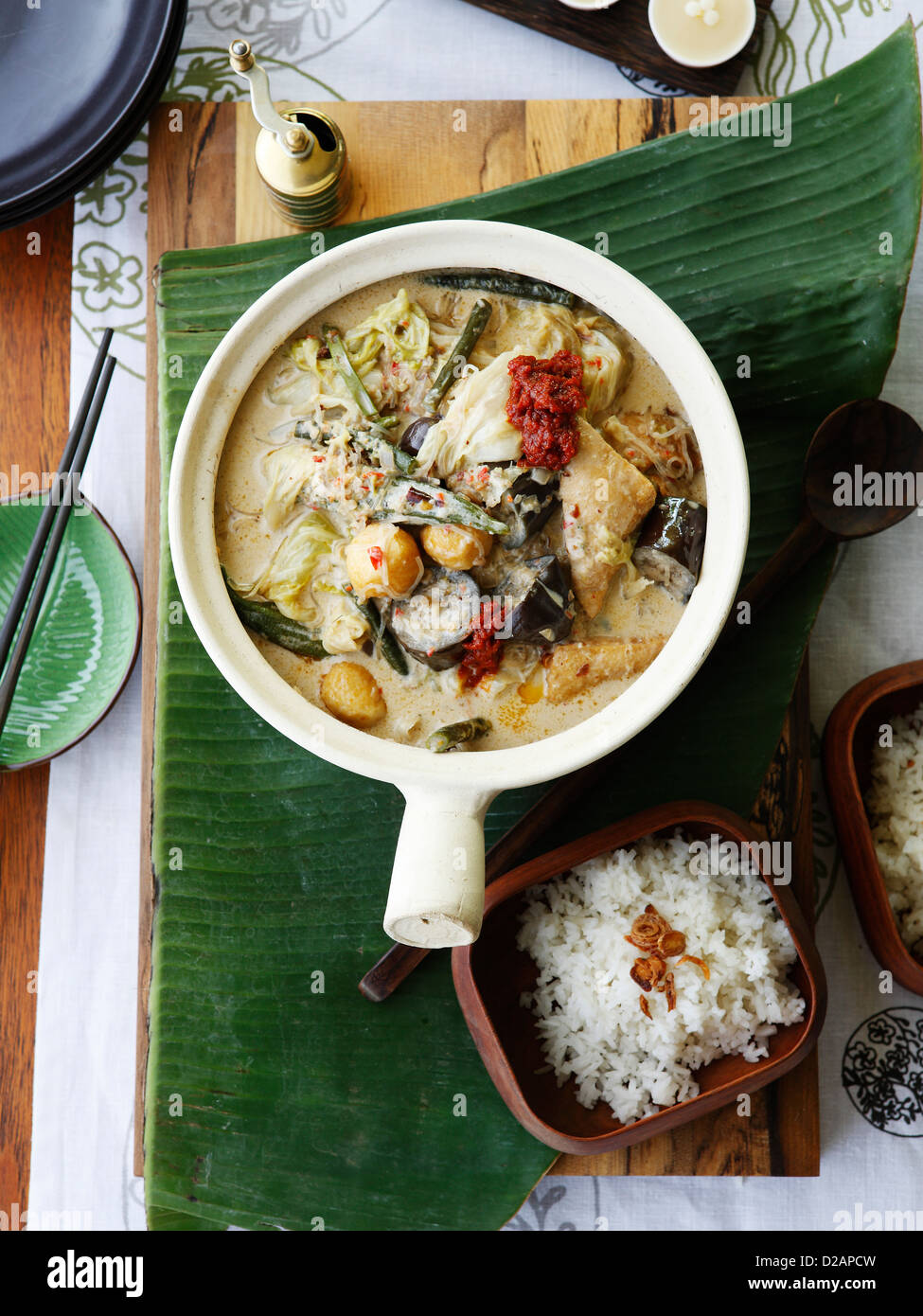 Pot of vegetable curry with rice Stock Photo - Alamy