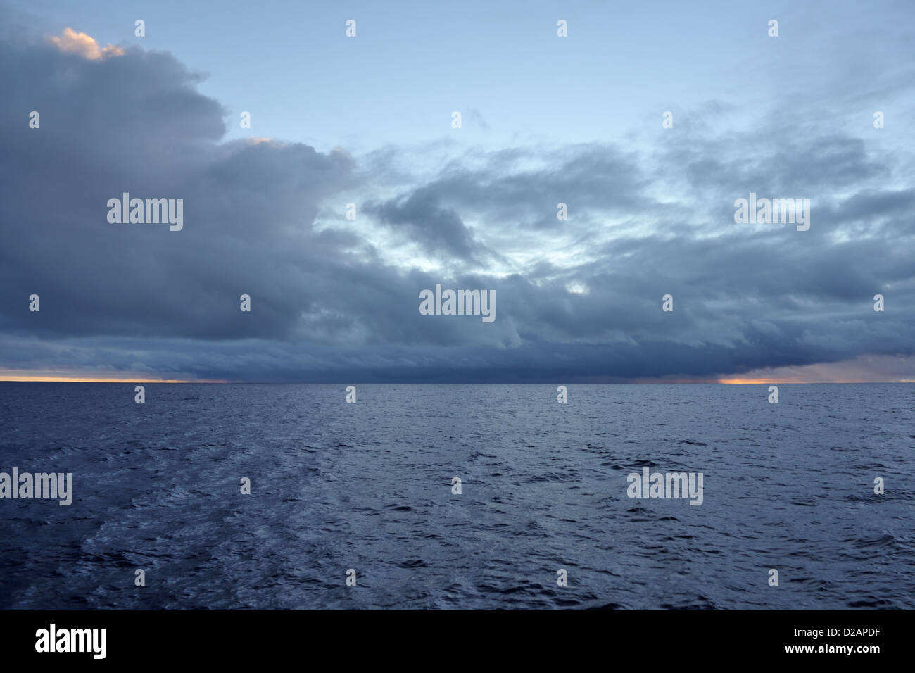 Squall line clouds ahead seen from a yacht sailing offshore in the ...
