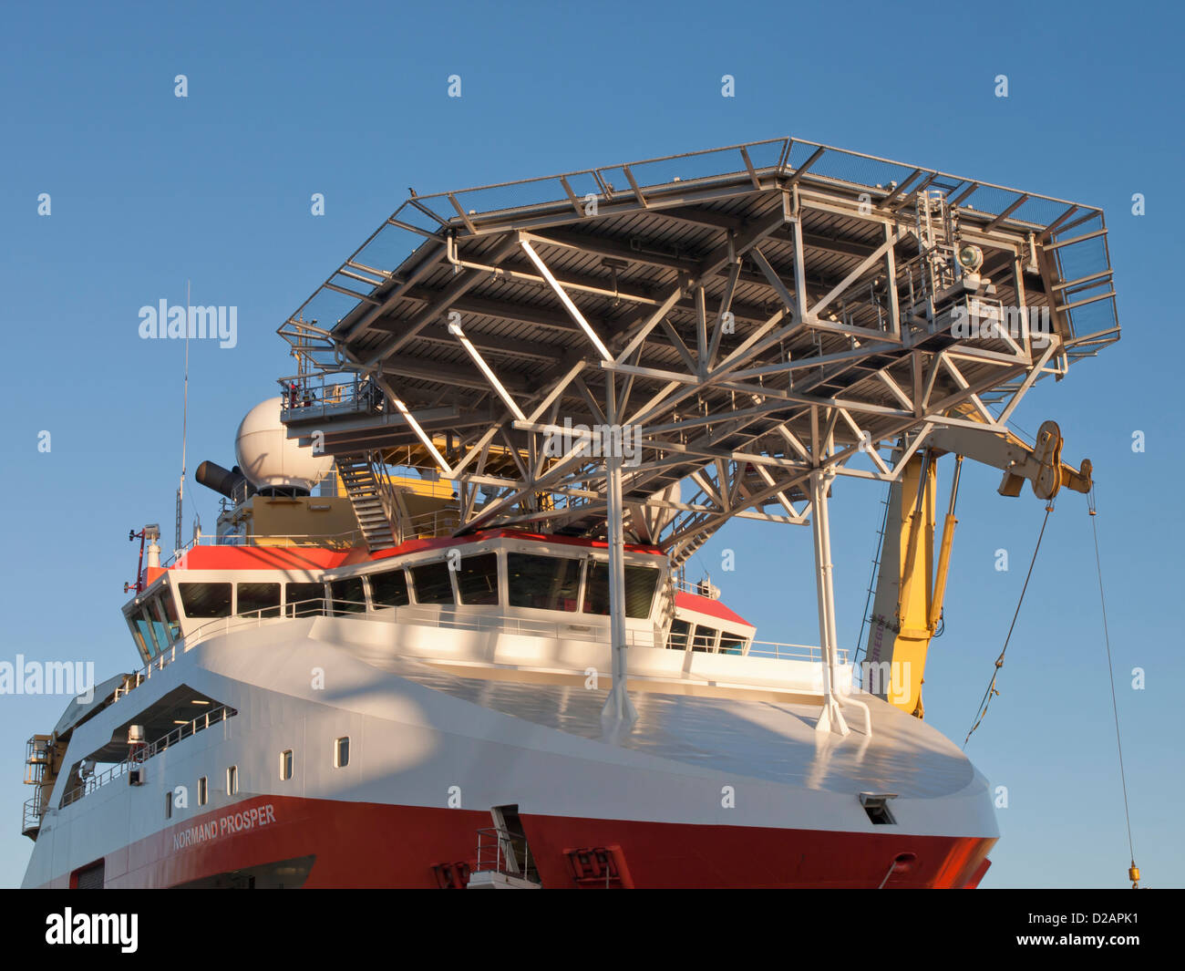 Oil industry supply ship with helicopter deck in the harbour of ...