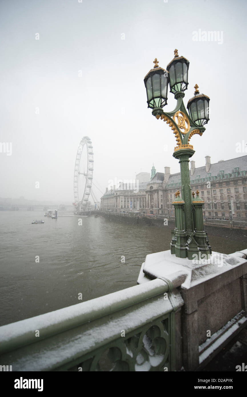 Westminster Bridge, London, UK. 18 January 2013. Snow falling in ...