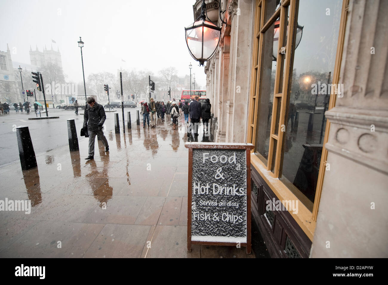 London, UK. 18/01/13. Snow falling in Central London creating bad ...
