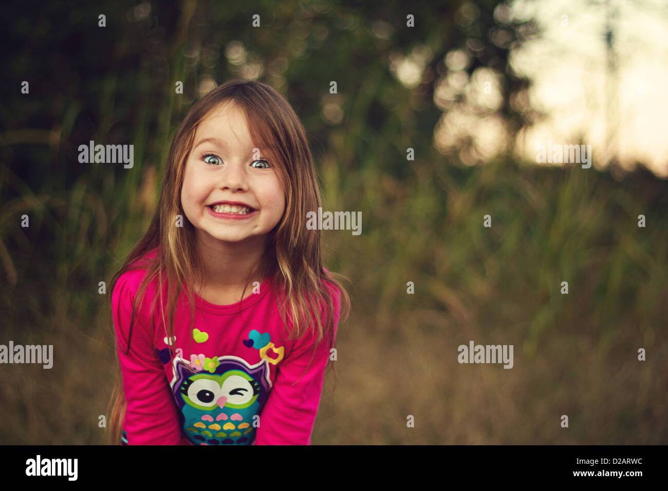 Young child smiling Stock Photo - Alamy