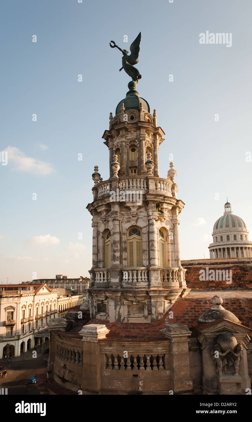 Statue on dome of ornate building Stock Photo - Alamy